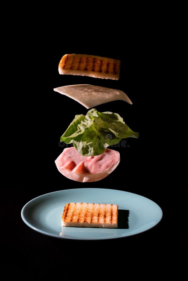 Construction of a Sandwich, with a Slice of Bread on a Plate, and in ...