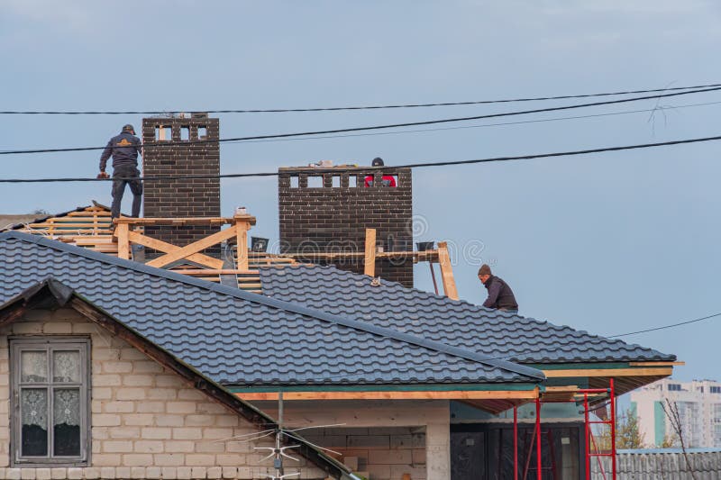 Construction Scene of Roofing Installation on a House, Showcasing Home ...