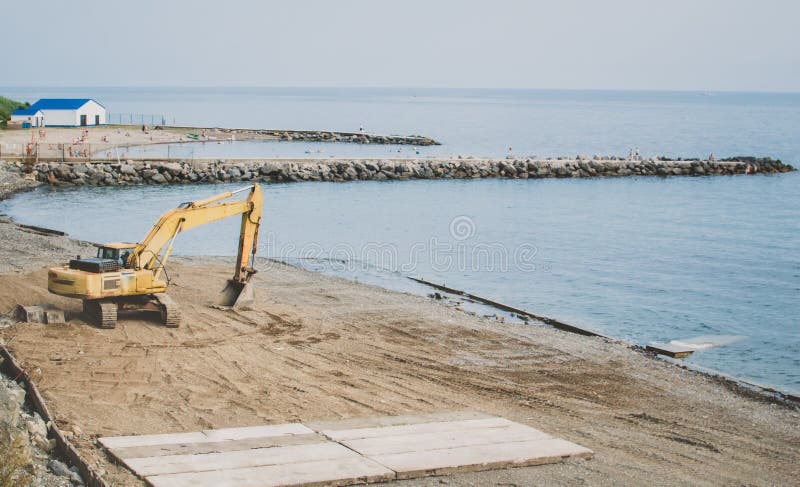 Construction by the sea stock photo. Image of engineer - 130541224