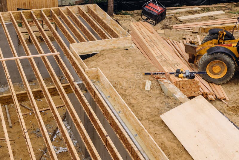 Construction Showing Massive Solid Wood Joists Construction Forklift ...