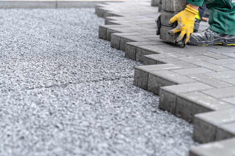 Construction of a Sidewalk from Concrete Blocks Stock Image - Image of ...