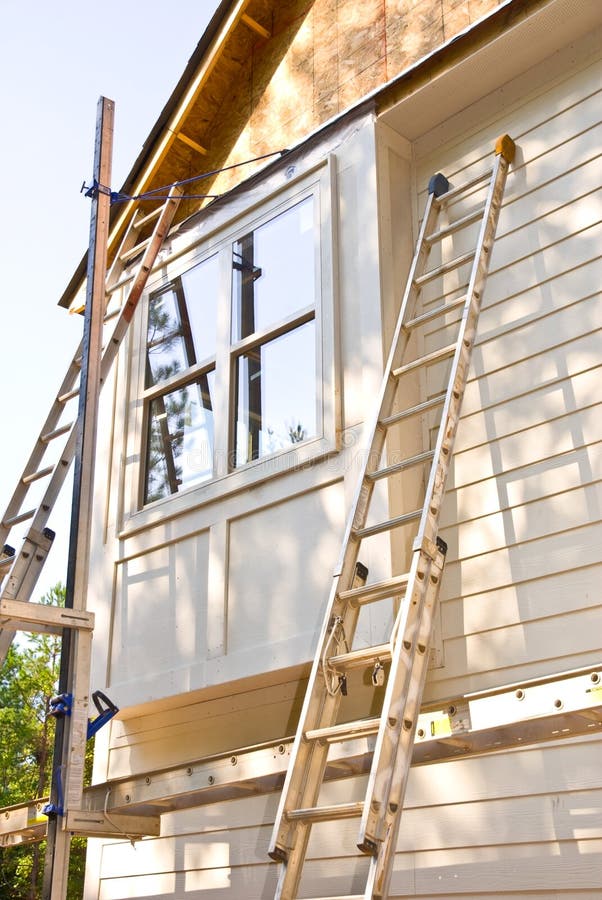 Construction/Siding Installation Stock Photo - Image of family, home ...