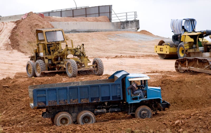 Roadwork - Digging Up the Road Stock Photo - Image of digging, machine ...