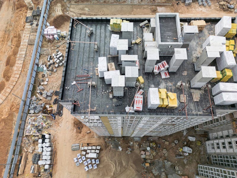 Construction Site Aerial View Showcasing the Rooftop Work and Materials ...