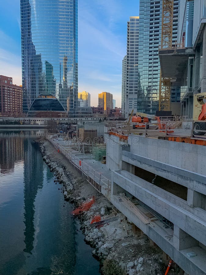 Construction Site Alongside Still Waters of Chicago River, Which are ...