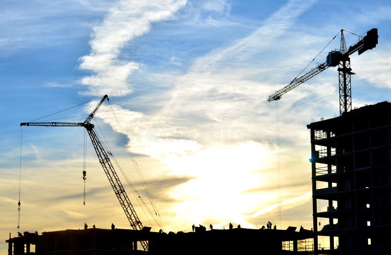 Construction Site and Cranes on the Sunset Background Stock Image ...