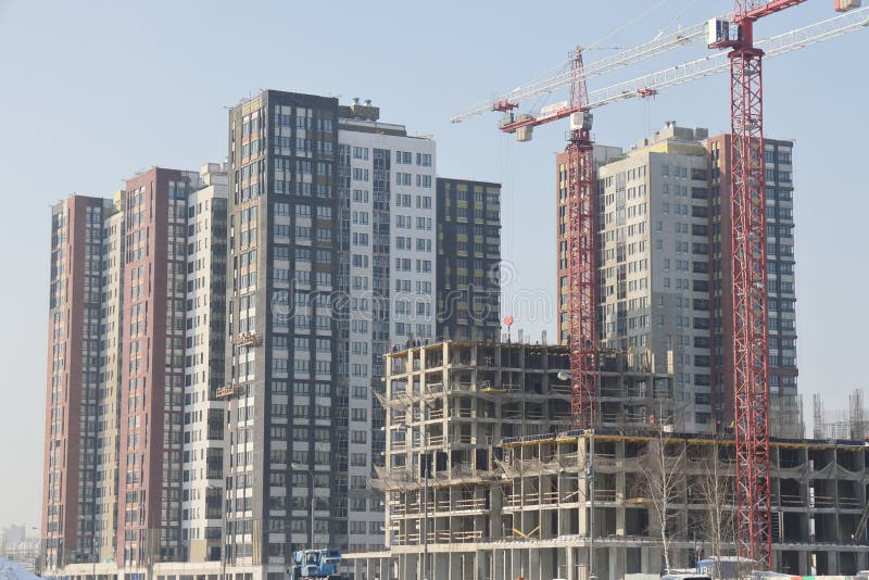 Construction Site Background. Hoisting Cranes and New Multi-storey ...