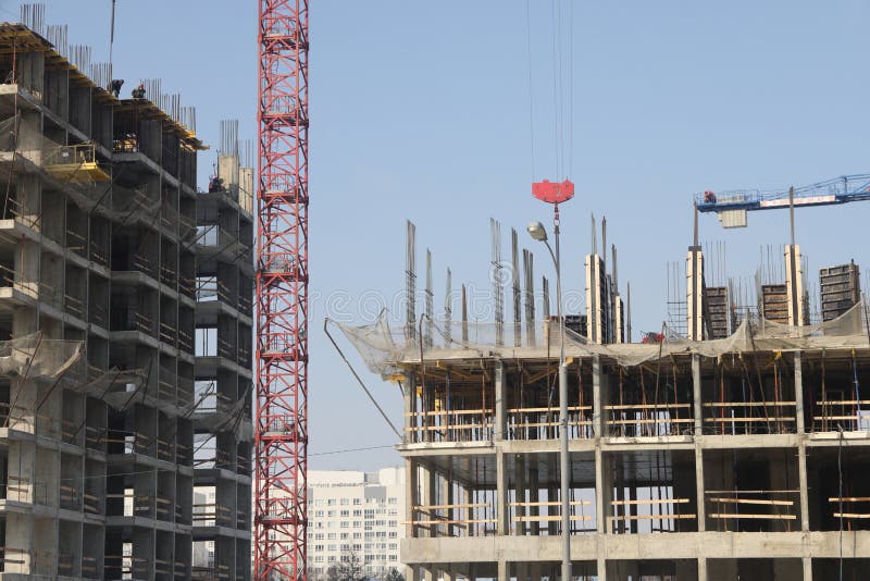 Construction Site Background. Hoisting Cranes and New Multi-storey ...