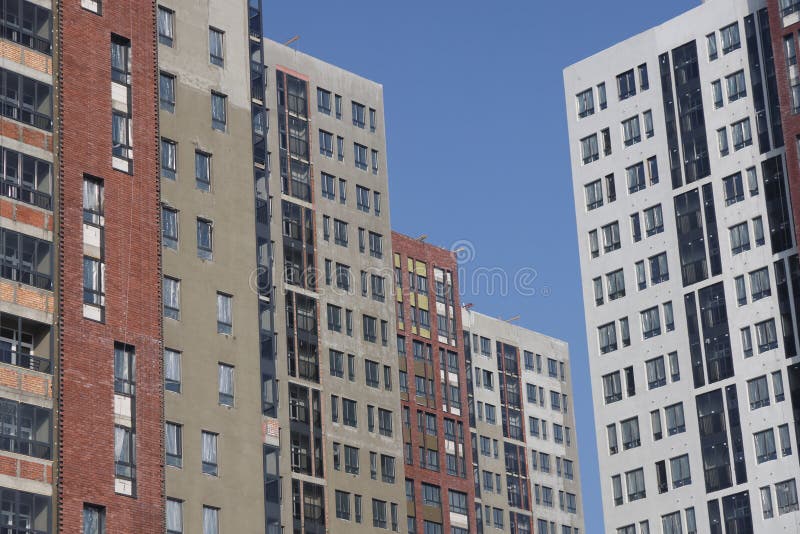 Construction Site Background. Hoisting Cranes and New Multi-storey ...