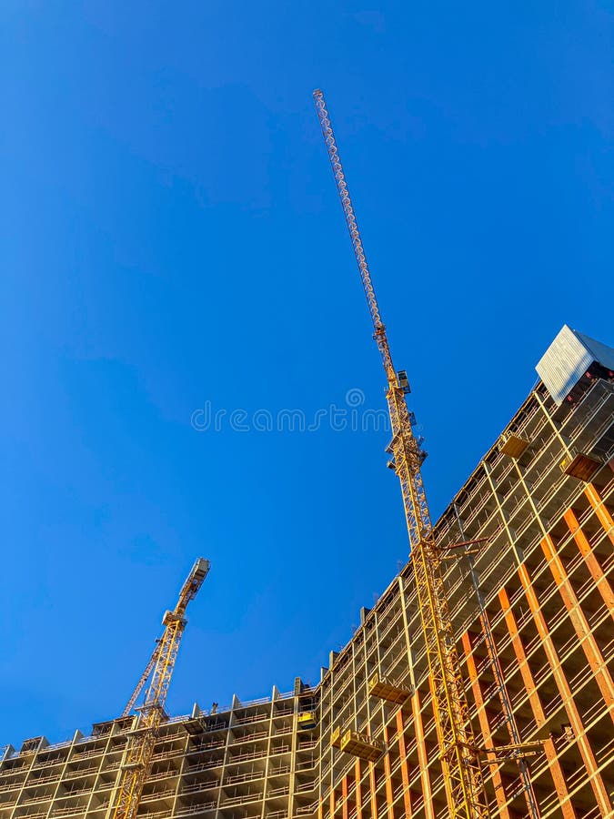 Construction Site with a Building Under Construction, Dominated by a ...