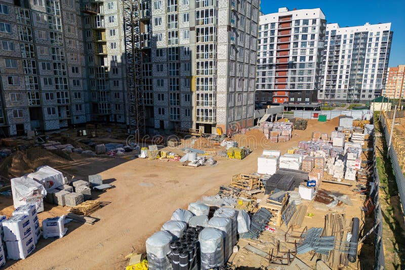 A Construction Site Bustling with Activity in the Heart of a City, with ...
