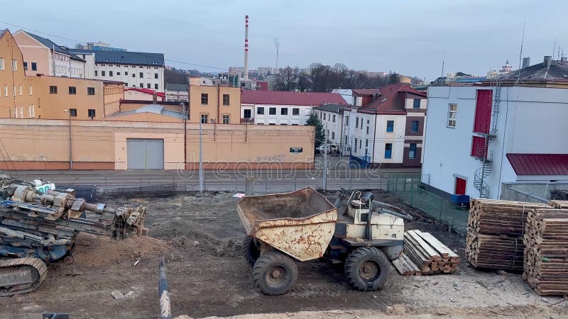 A Construction Site Bustling with Heavy Machinery and Numerous ...