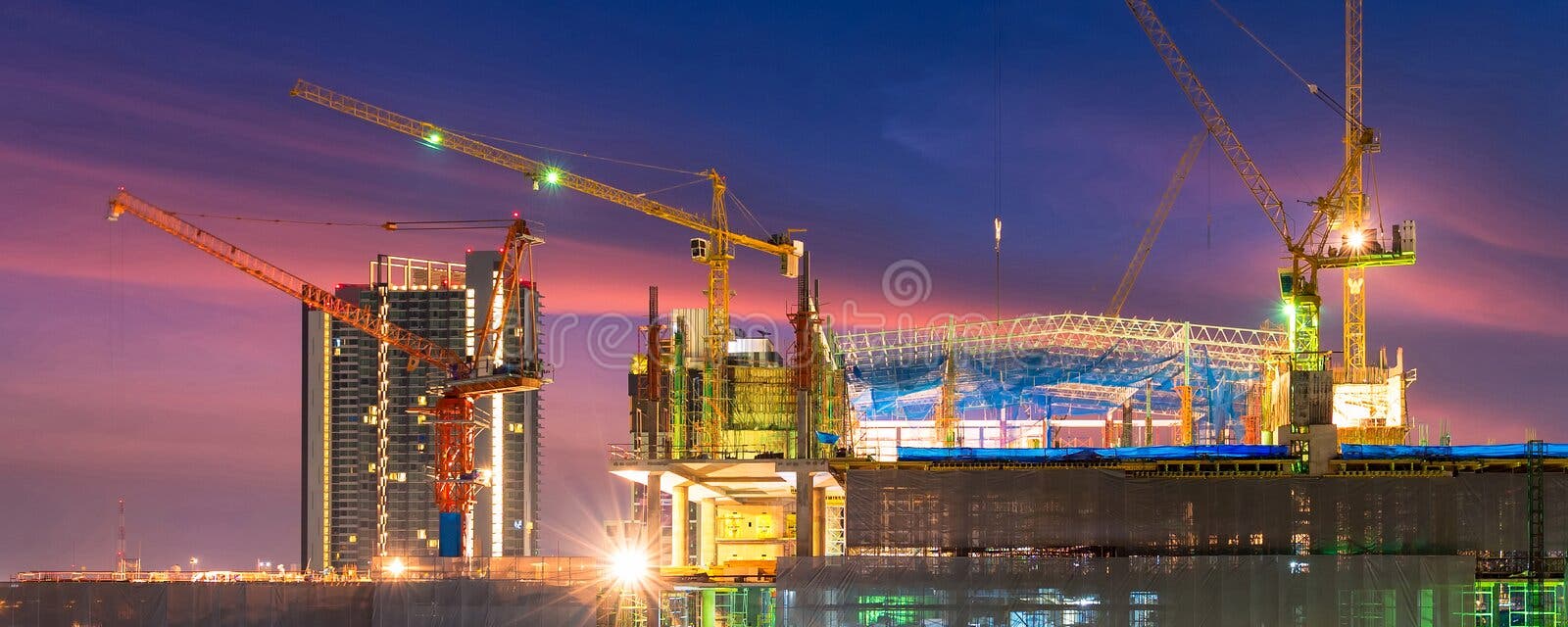 Silhouette of Manpower with Excavator Loading Cement into Construction ...