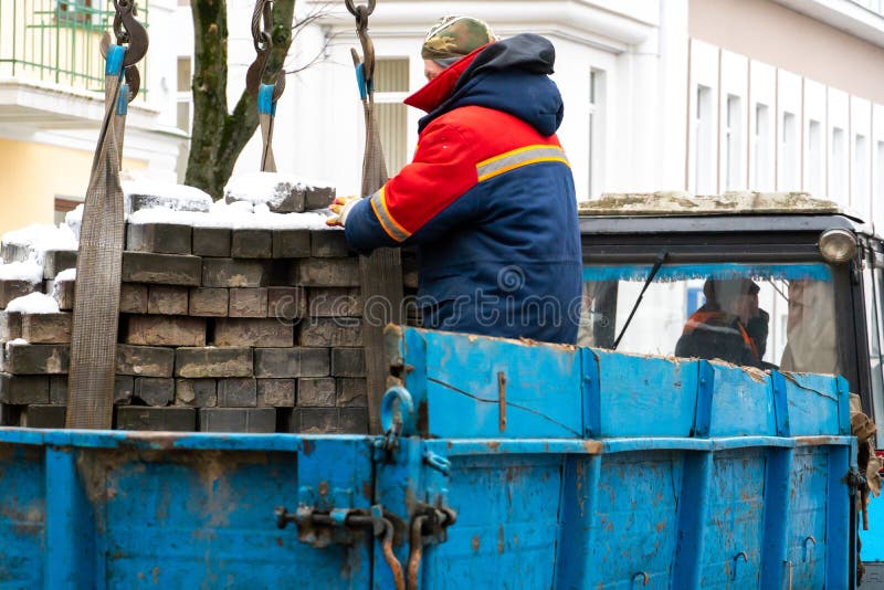 Construction Site in the City in Winter. Workers Work at the Facility ...
