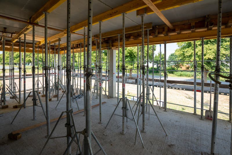 A Construction Site, Concrete Columns for a Factory Building are Placed ...