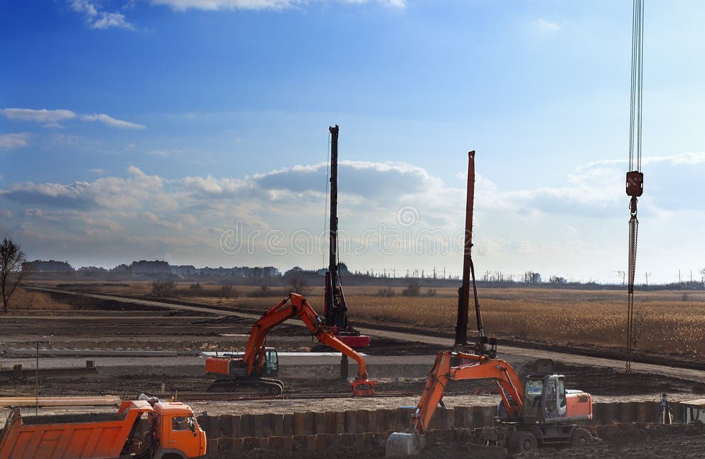 Construction Site with Construction Machines an Excavator and Piling ...