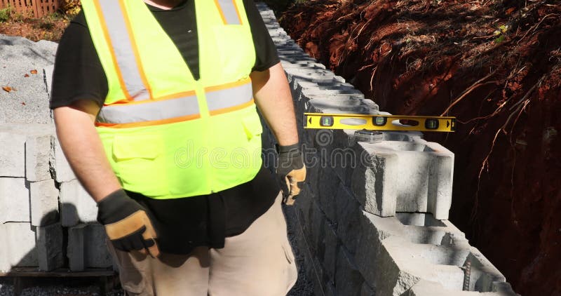 On the Construction Site, a Contractor Works on Establishing a Large ...