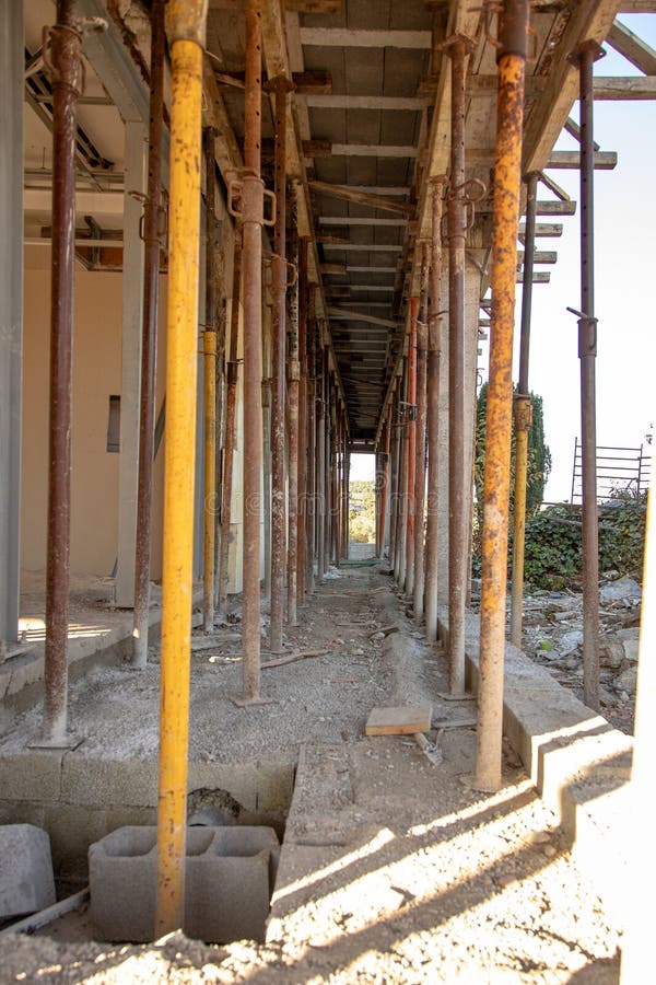 A Construction Site Corridor Supported by Metal Scaffolding, Showing ...