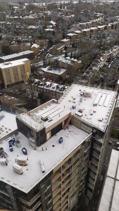 Construction Site Covered with Snow Seen from High in Winter Time ...
