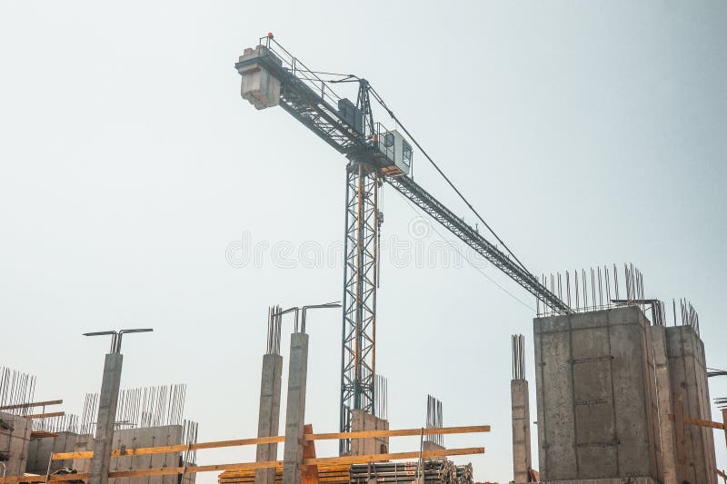 Construction Site, Crane Rising Above the Building Under Construction ...