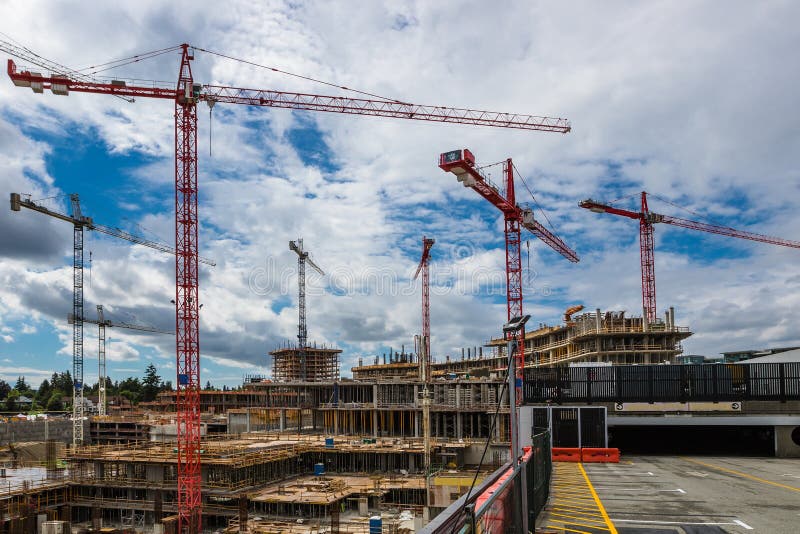 Construction Site with Cranes on the Background of Cloudy Sky Editorial ...