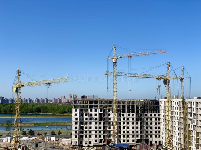 Construction Site with Cranes and Buildings Symbolizes Urban ...
