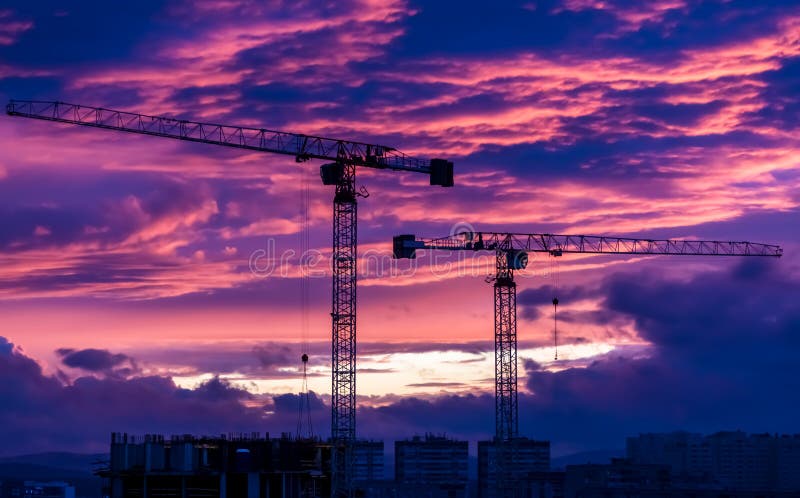 Construction Site with Cranes on Purple Sunset Stock Photo - Image of ...