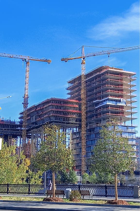 Construction Site with Cranes and Unfinished Buildings Stock Photo ...