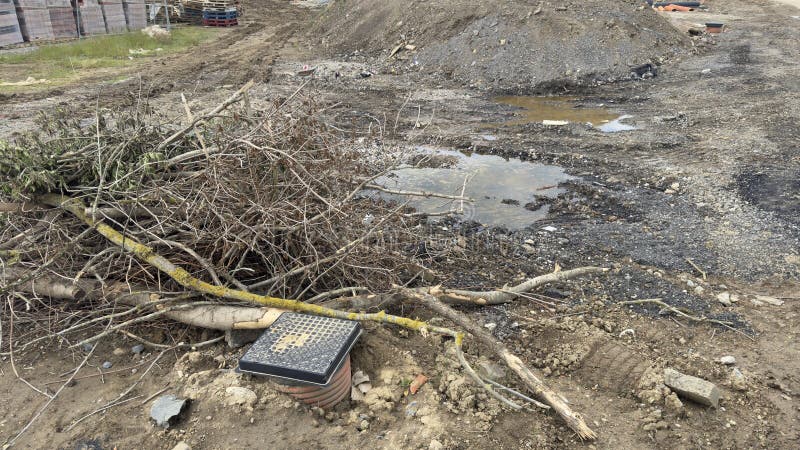 Construction Site with Debris and Puddles Stock Photo - Image of soil ...