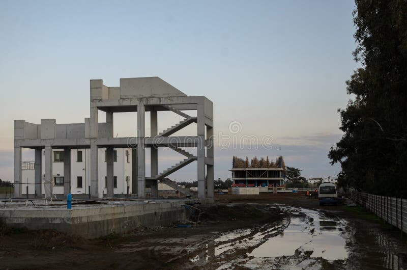 Construction Site at Dusk Showcasing Modern Architecture and Ongoing ...