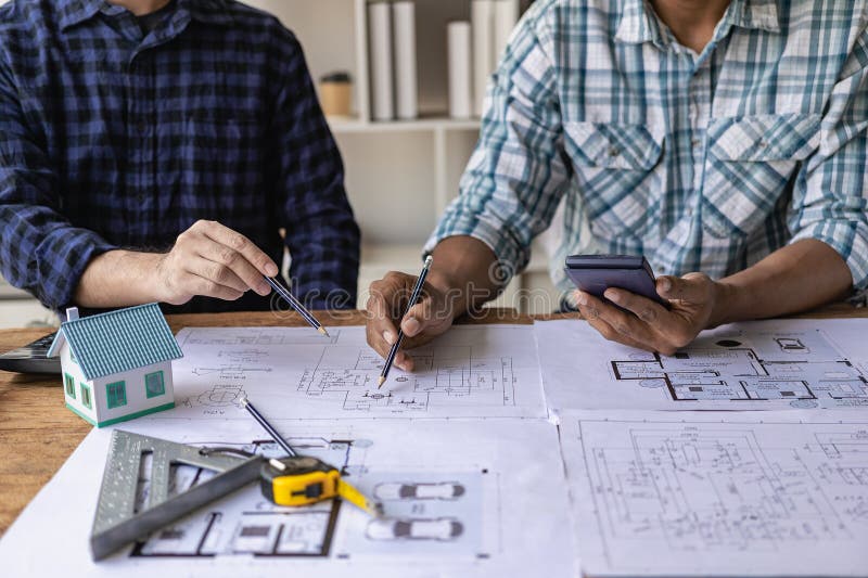 Construction Site Engineer Two Businessmen Engineering Objects in the Workplace with Engineers ...