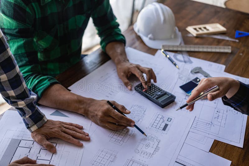 Construction Site Engineer Two Businessmen Engineering Objects in the Workplace with Engineers ...