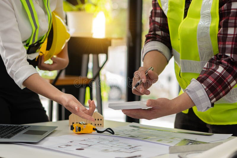 2 Construction Site Engineers on-site Engineering Objects Work with ...