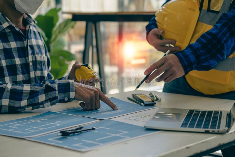 2 Construction Site Engineers on-site Engineering Objects Work with ...