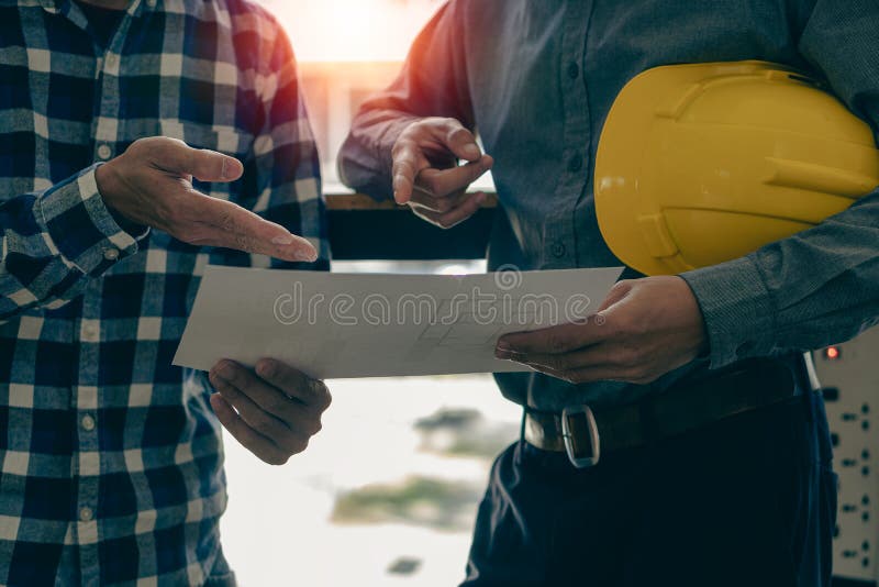 2 Construction Site Engineers on-site Engineering Objects Work with ...