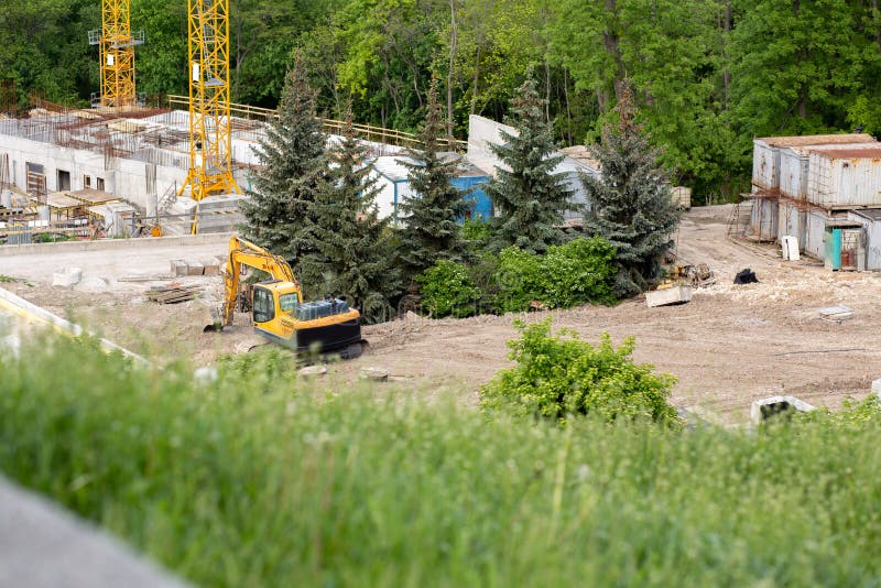 Construction Site with Excavator and Building Materials Stock Photo ...