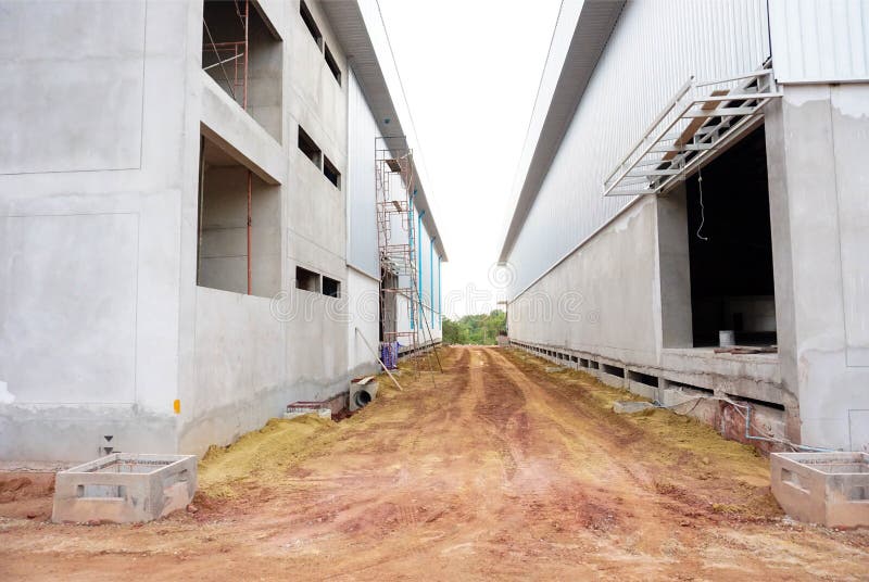 Construction Site - Construction Factory Near Non-asphalt Road Stock ...