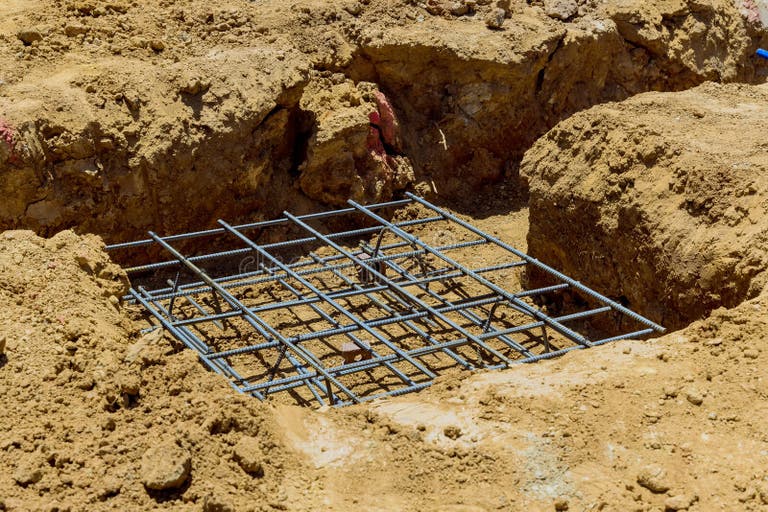 Construction Site Features Prepared Foundation with Reinforcement Bars ...