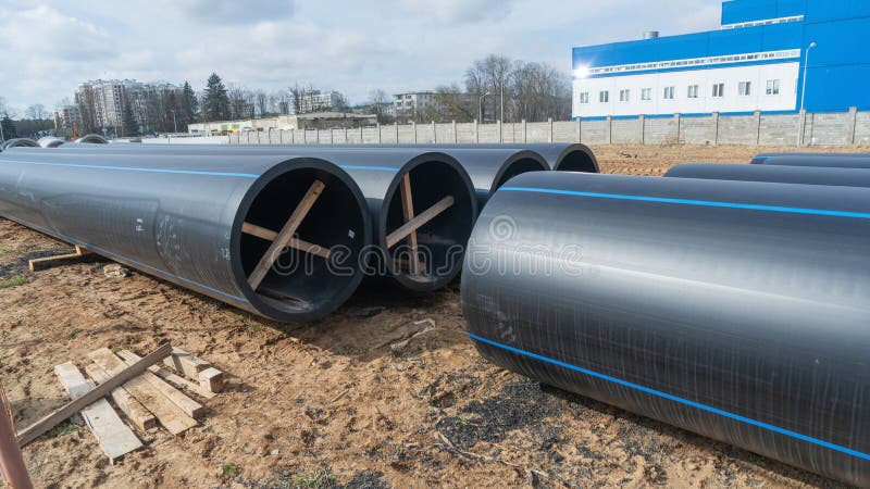 Construction Site Featuring Various Diameters of Polyethylene Pipes for ...