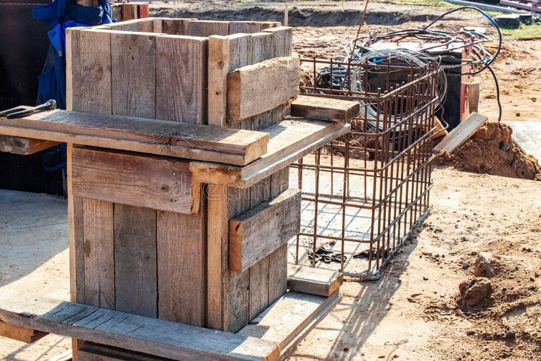 Construction Site Featuring Wooden Formwork and Rebar Assembly for ...