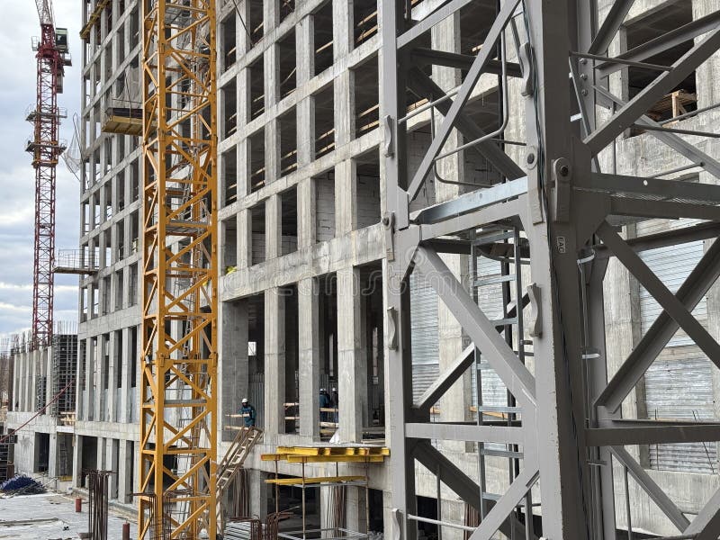 Construction Site with Workers and Tower Cranes Stock Image - Image of ...