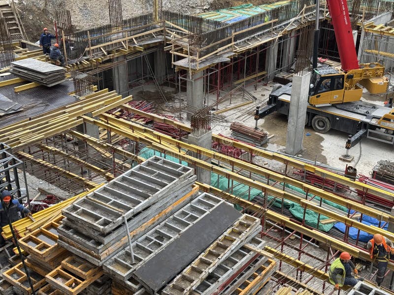 Construction Site with Workers and Tower Cranes Stock Image - Image of ...