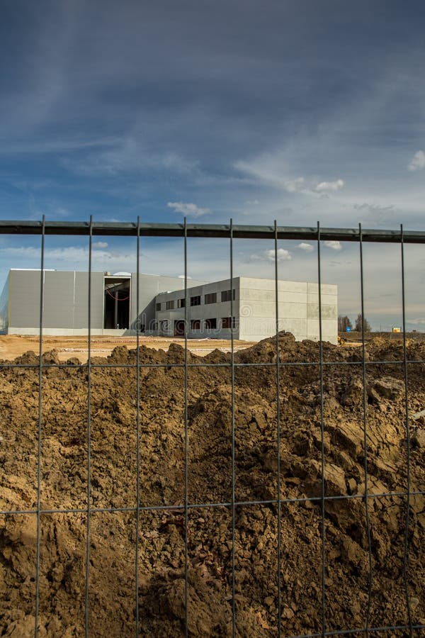 Construction Site with a Fence Stock Photo - Image of house, blue ...