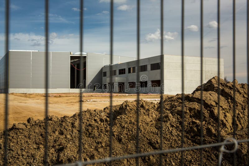 Construction Site with a Fence Stock Photo - Image of house, blue ...