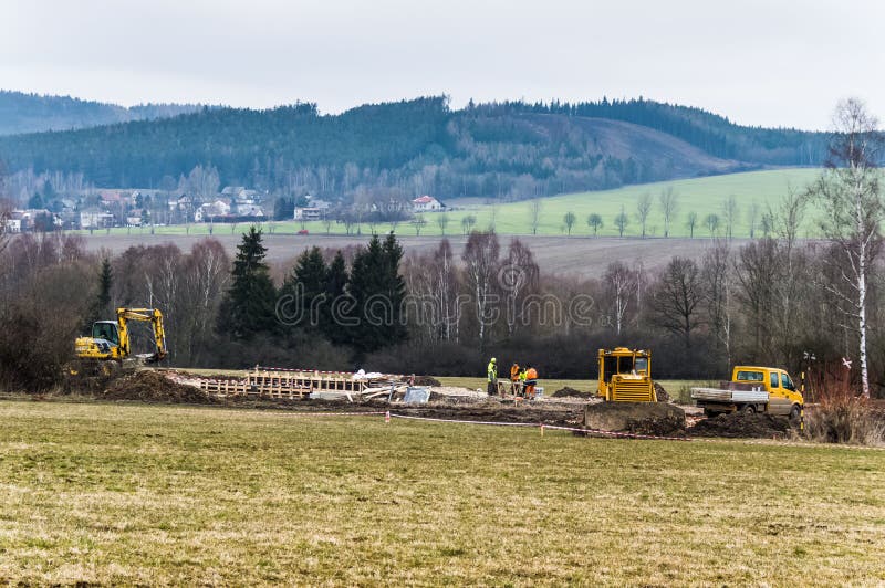 Construction Site with Flat Land in the Forefront and Countryside in ...