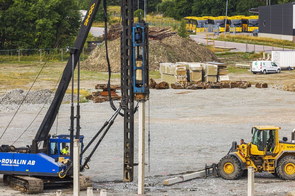 Construction Site with Heavy Machinery Operating on Foundation Piling ...