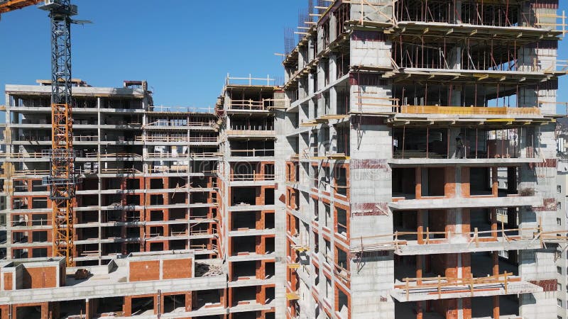 Construction Site of a High-rise Building at Sunny Day. the Structure S ...