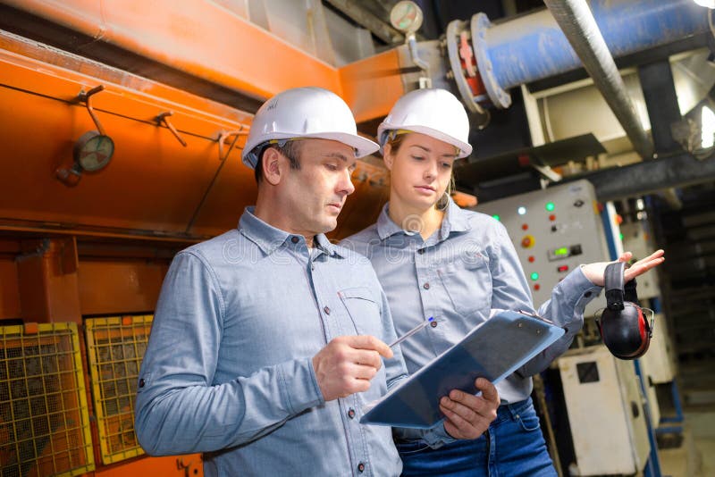 Site Inspector Making Inspection Report in Industrial Hall Stock Image ...
