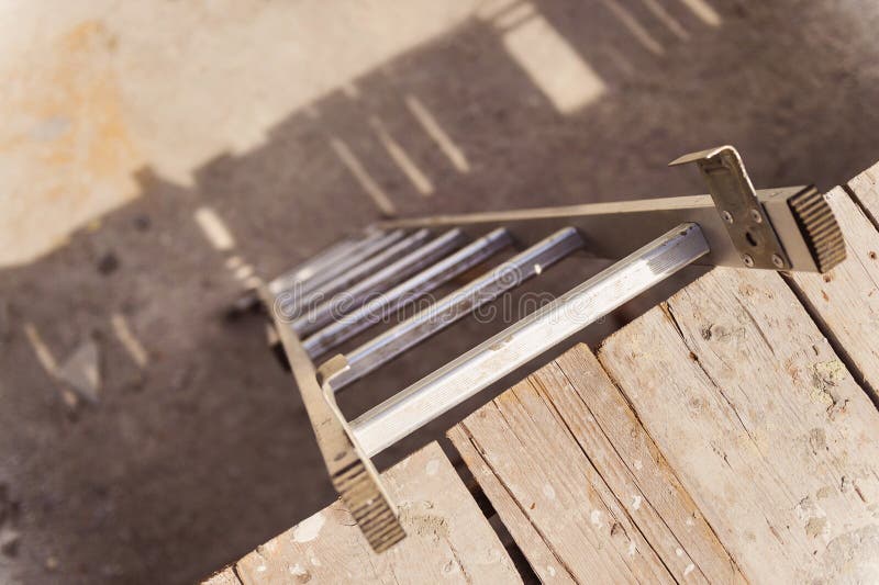 Wooden Ladder in a Construction Site Stock Image - Image of ladder ...