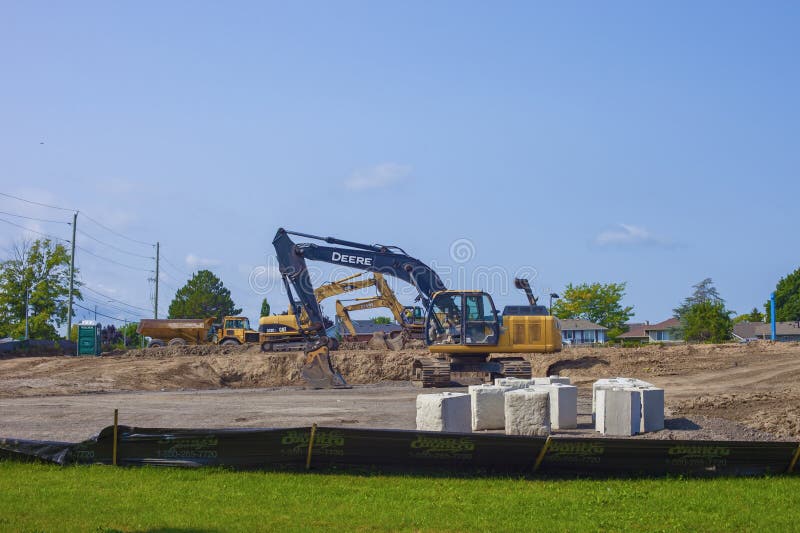 Construction Site. Machines Working on a Building Site. Editorial ...